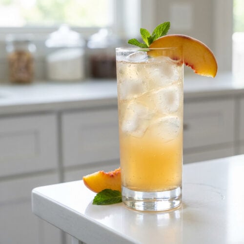 Peach Rum Fizz Cocktail Recipe - Thirsty Tales