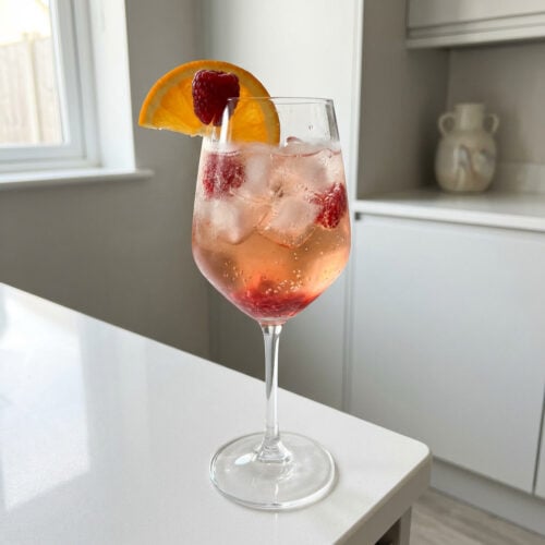 Raspberry Aperol Spritz Cocktail Recipe - Thirsty Tales