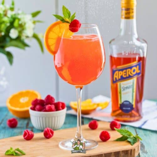 Raspberry Aperol Spritz Cocktail Recipe - Thirsty Tales