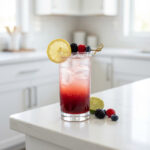 Berry Citrus Fizz Mocktail Recipe - Thirsty Tales